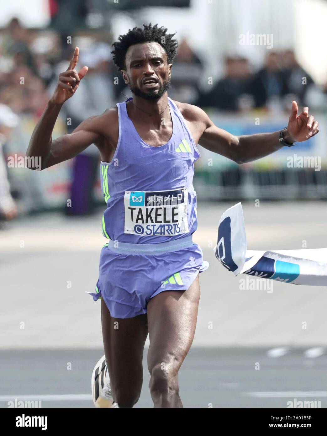 Tadese Takele of Ethiopia crosses the finish line during Tokyo Marathon ...
