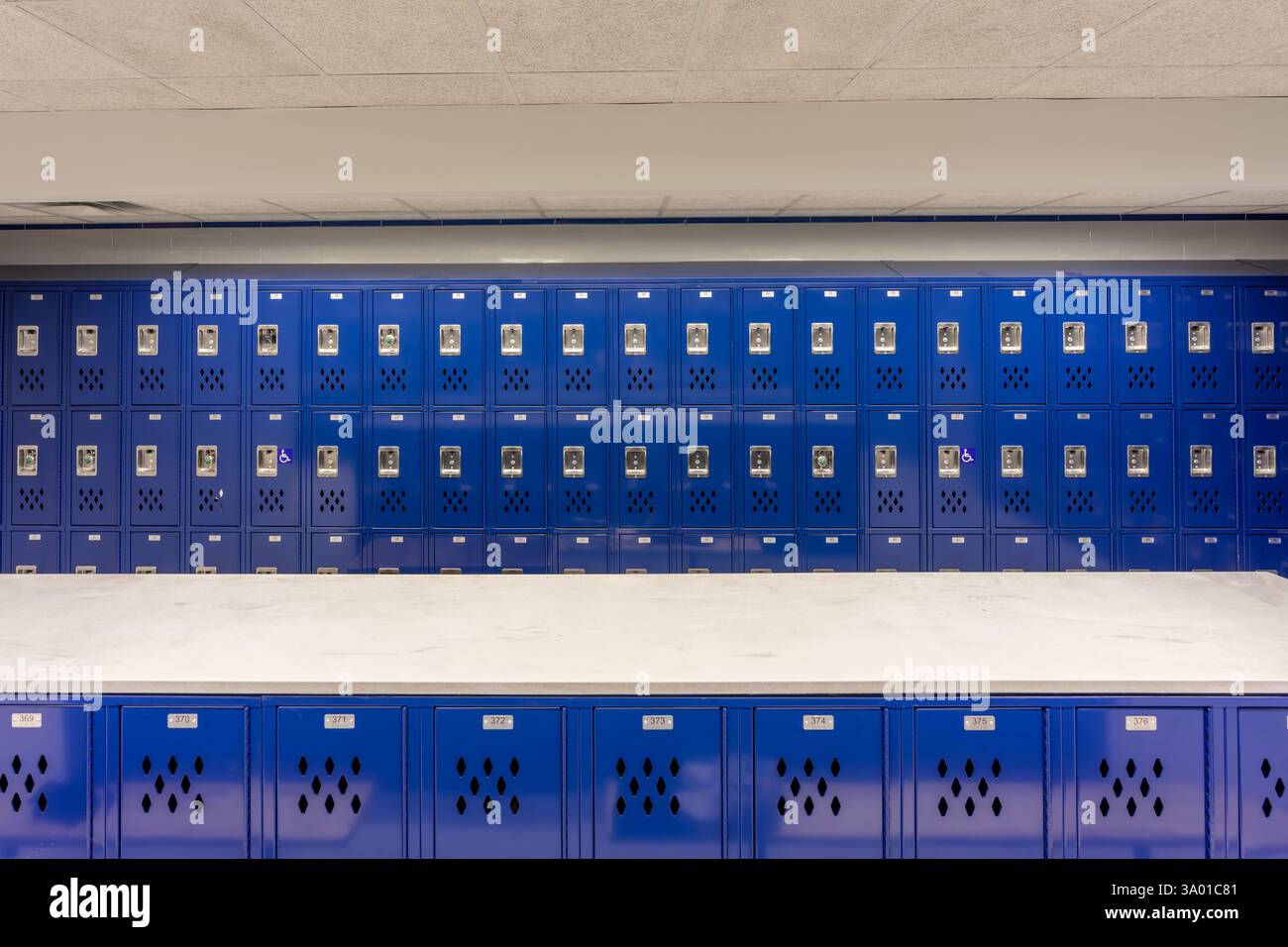 Empty team locker room, changing room, with traditional blue metal ...