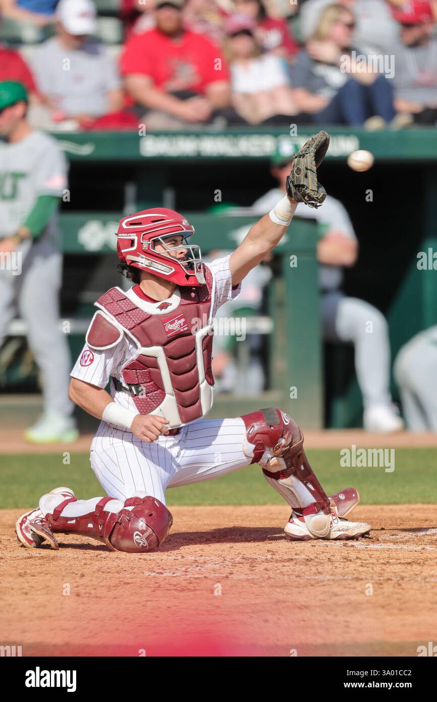 March 1, 2025: Arkansas catcher Zane Becker (17) raises up to catch a ...