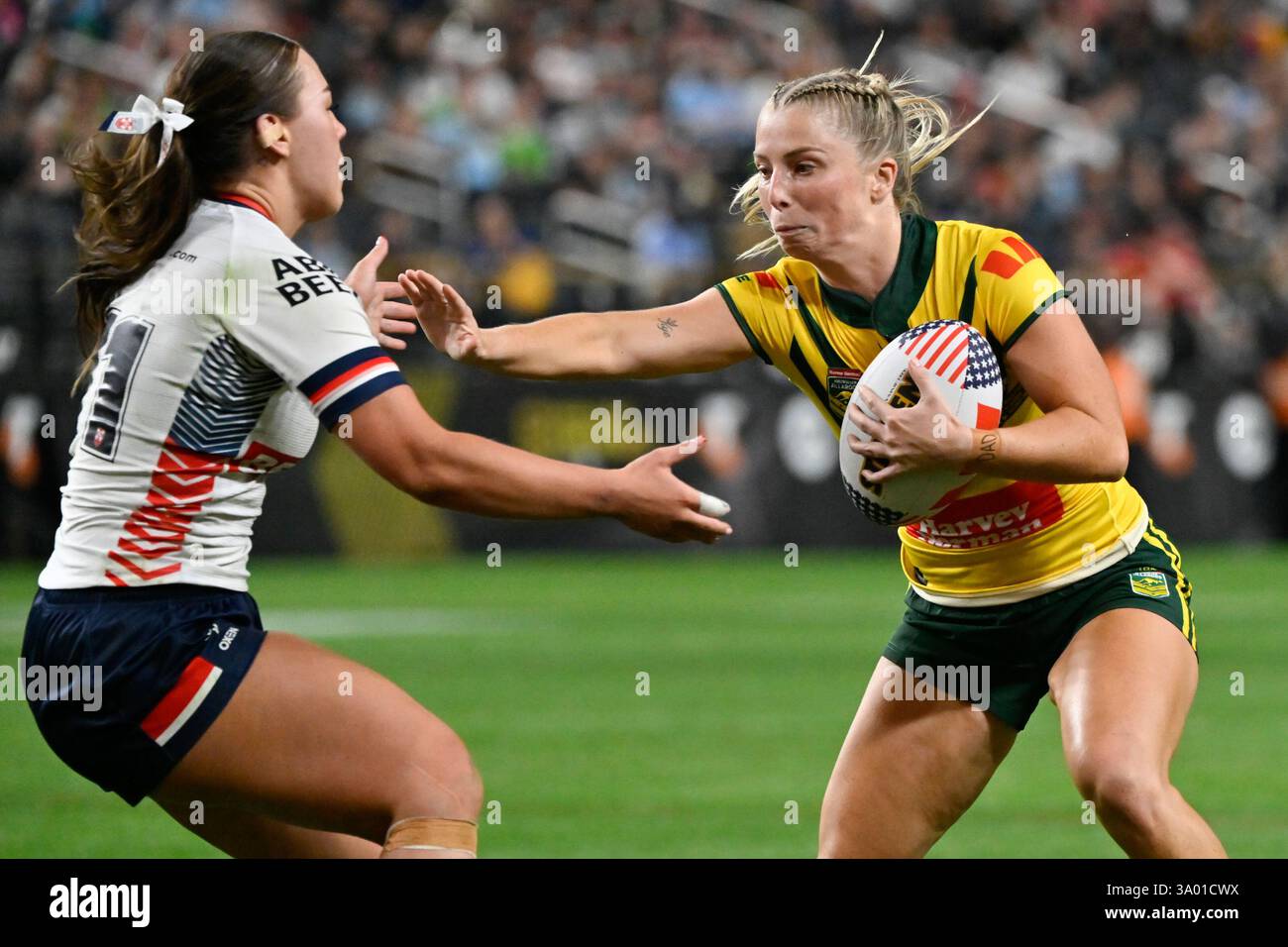 Australian Jillaroo Tarryn Aiken, right, fends off a defender during ...