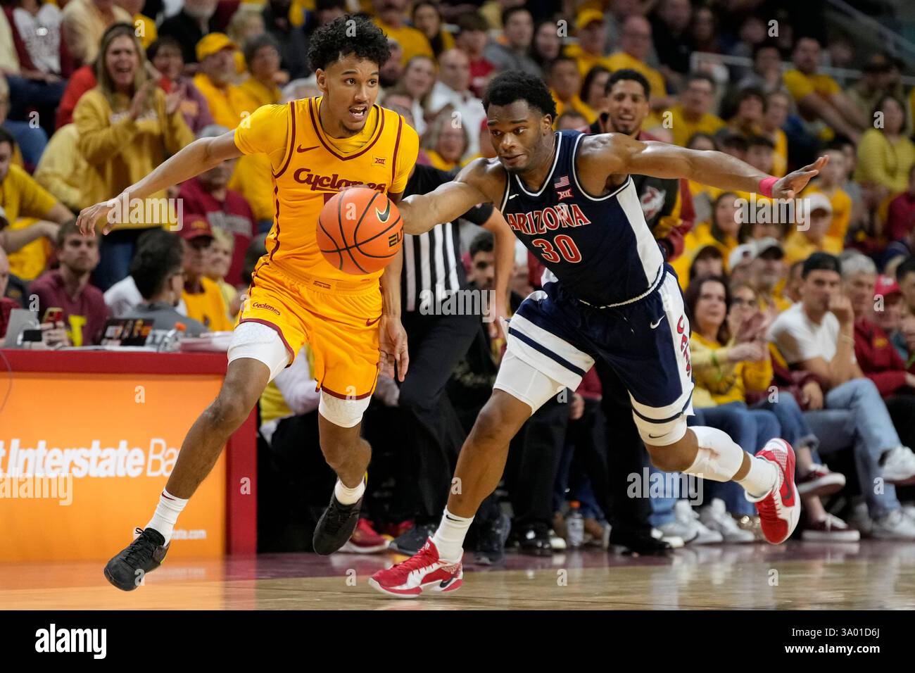 Iowa State guard Curtis Jones, left, steals the ball from Arizona ...