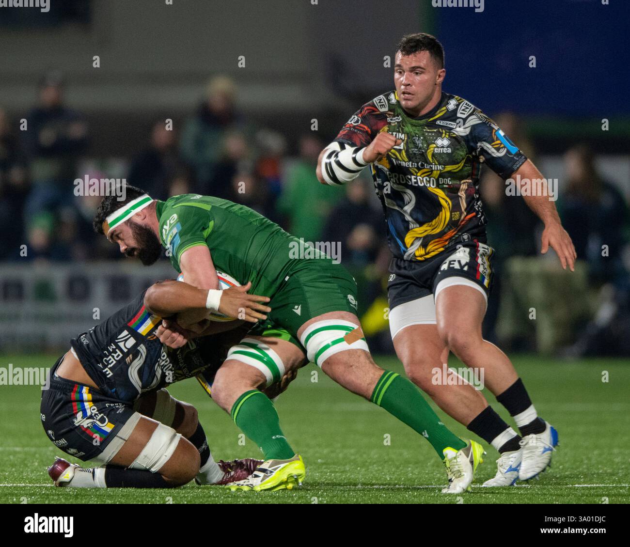 Paul Boyle of Connacht with the ball tackled by Toa Halafihi of ...