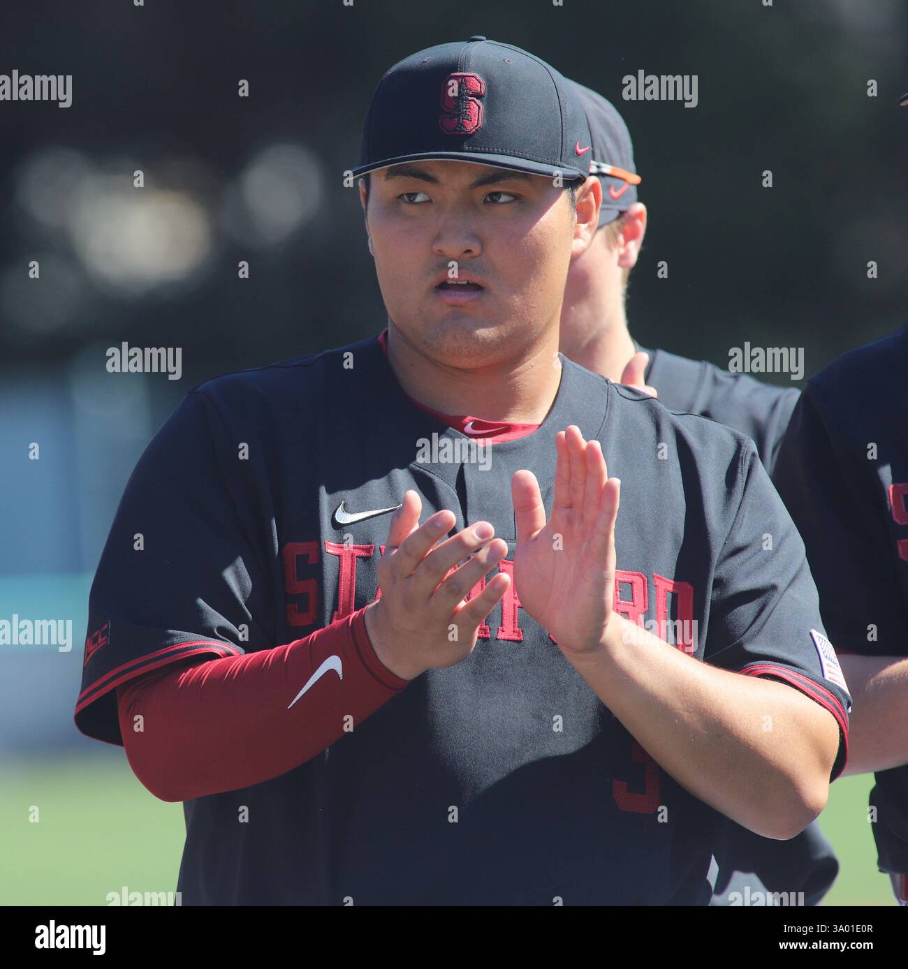 Stanford baseball player Rintaro Sasaki claps before a game against ...