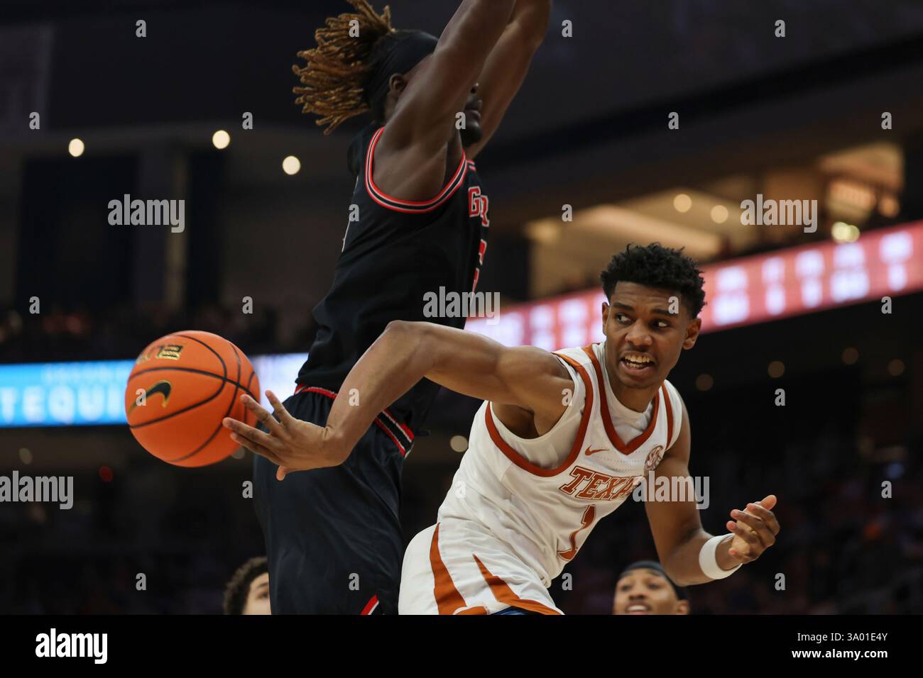 AUSTIN, TX - MARCH 01: Texas Longhorns guard Julian Larry (1) passes ...