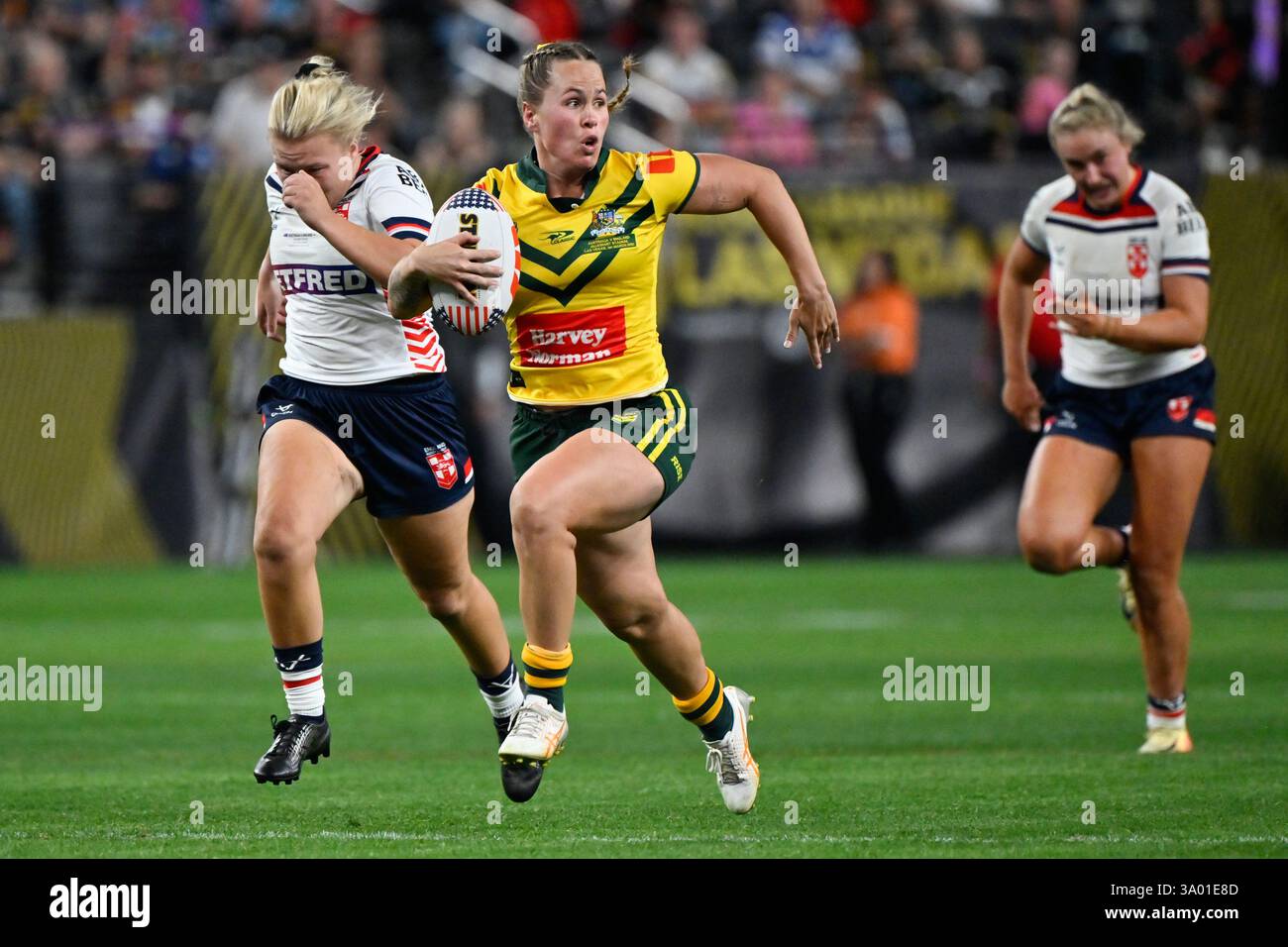 Australian Jillaroo Keilee Joseph reacts as she runs to score a try ...