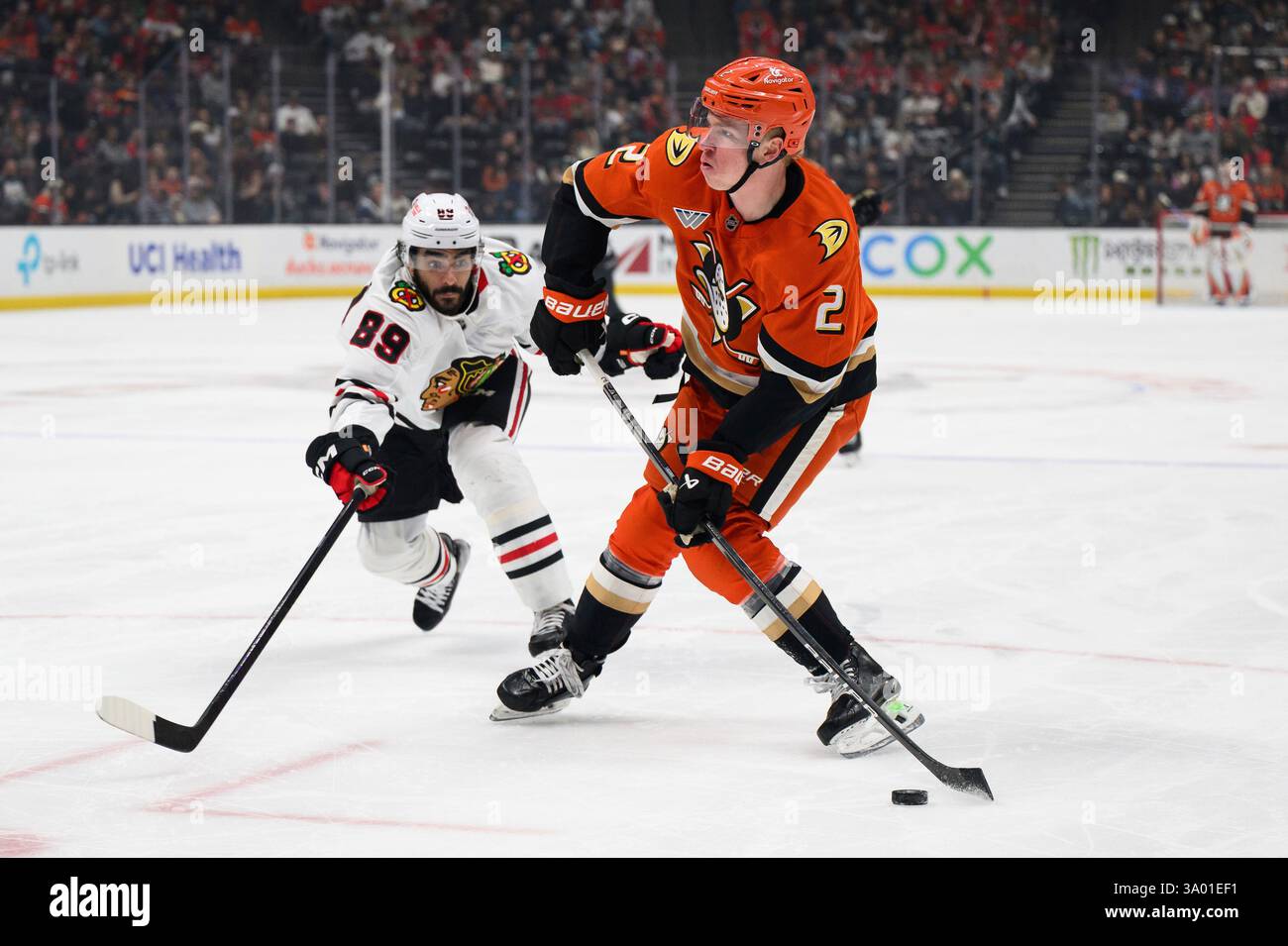 Anaheim Ducks defenseman Jackson LaCombe (2) shoots while under ...