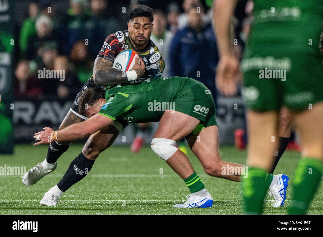 Galway, Ireland. 02nd Mar, 2025. Malakai Fekitoa of Benetton tackled by ...