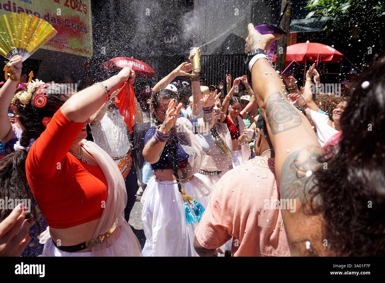 Revelers have fun at the carnival street in the Bollywood bloco party ...