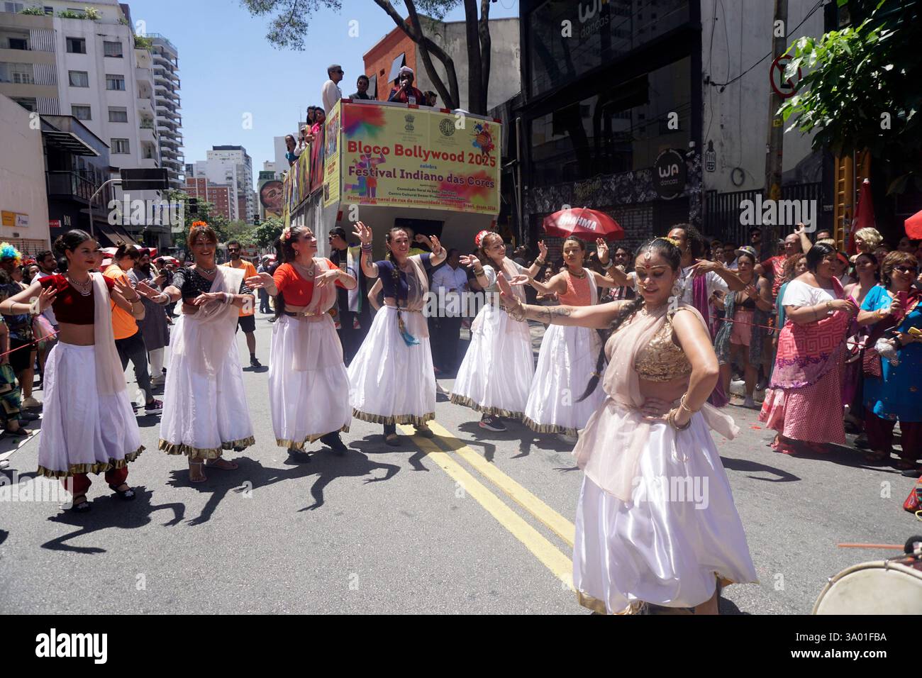 Revelers have fun at the carnival street in the Bollywood bloco party ...