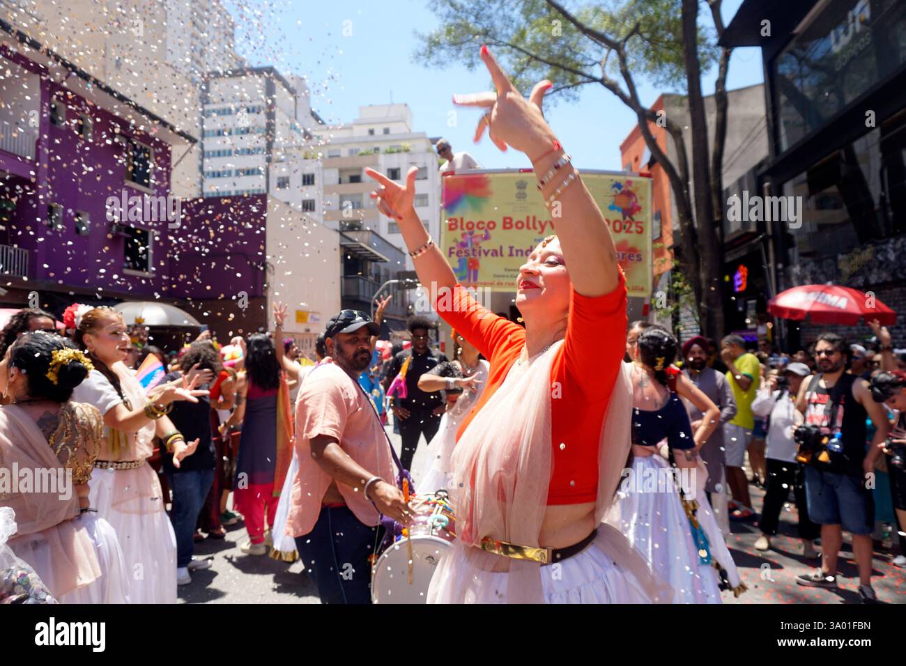 Revelers have fun at the carnival street in the Bollywood bloco party ...