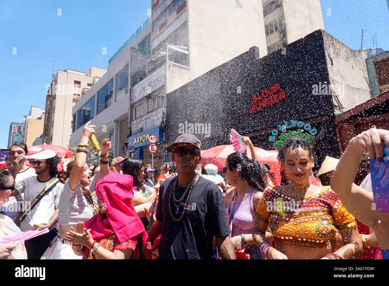 Revelers have fun at the carnival street in the Bollywood bloco party ...