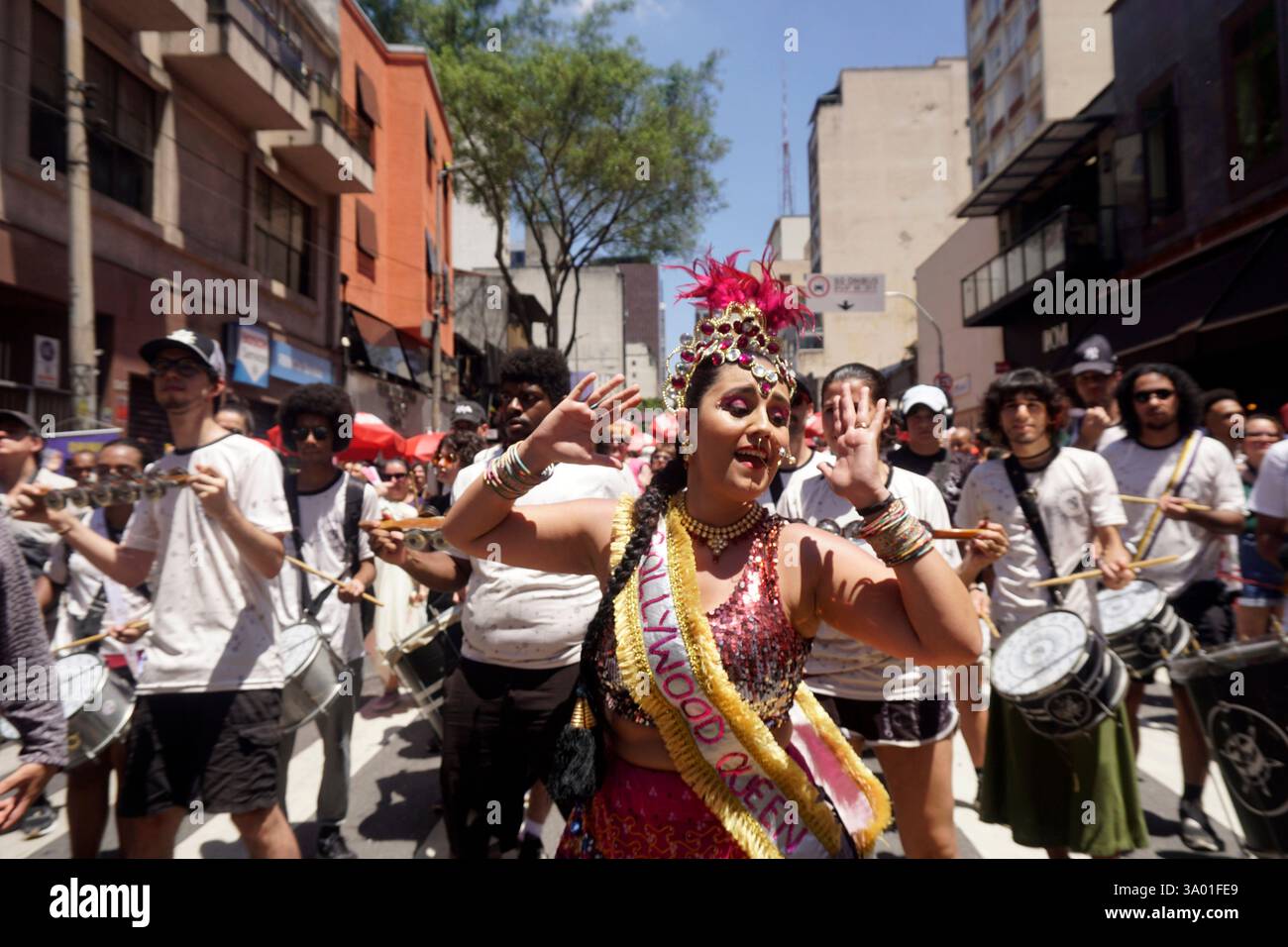 Revelers have fun at the carnival street in the Bollywood bloco party ...