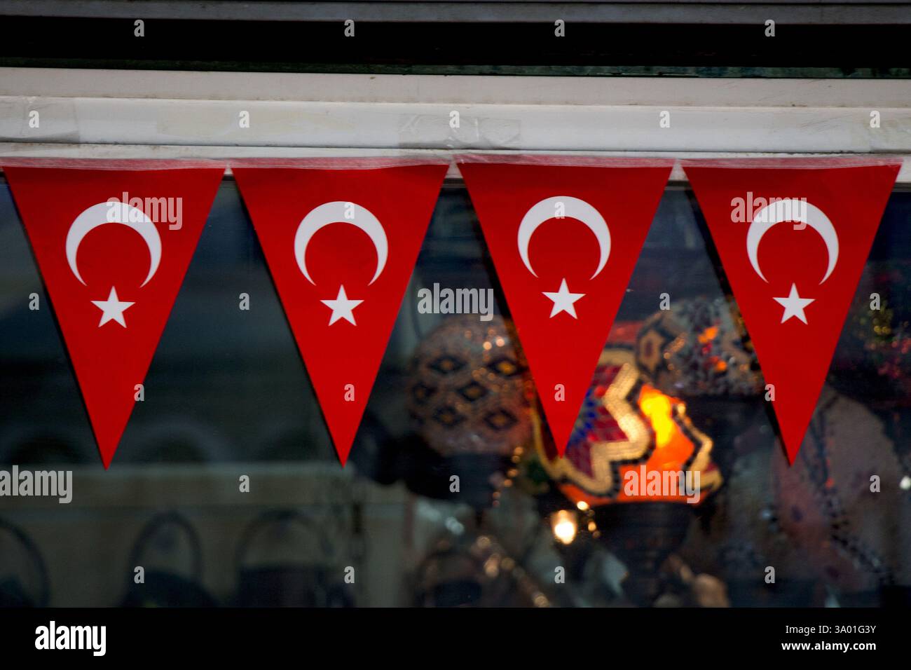Triangle shaped Turkish national flags are attached to a rope Stock ...