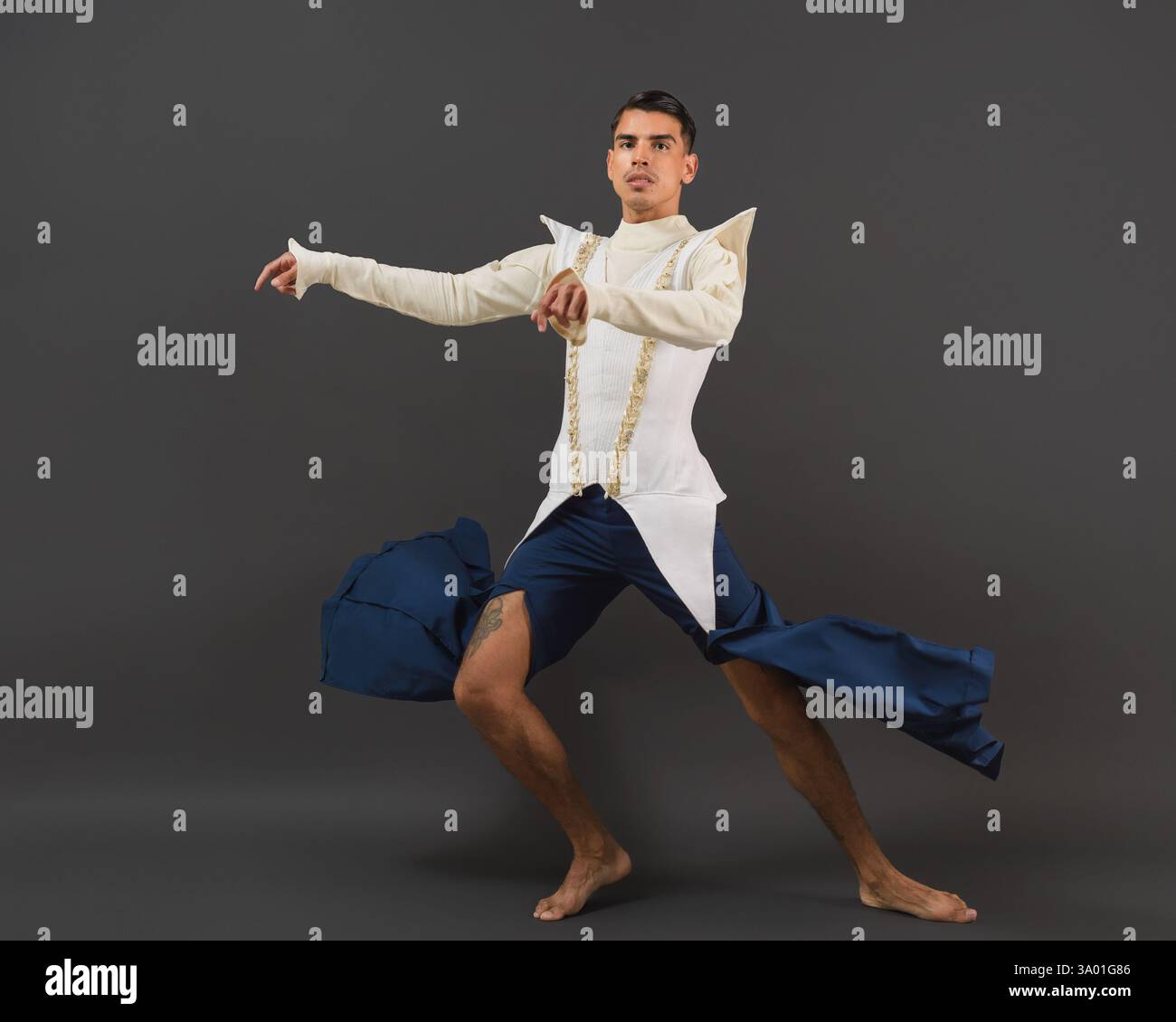 A captivating image of a male dancer in a sophisticated, flowing ...