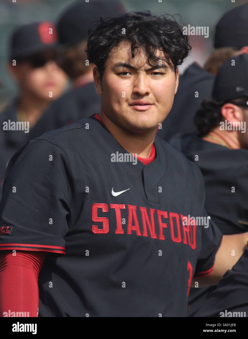Stanford baseball player Rintaro Sasaki in the dugout during game one of a doubleheader against ...