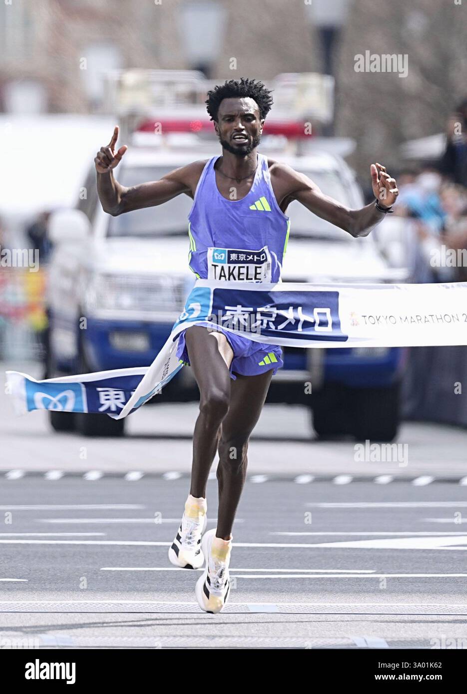 Ethiopia's Tadese Takele crosses the finish line for the Tokyo Marathon ...
