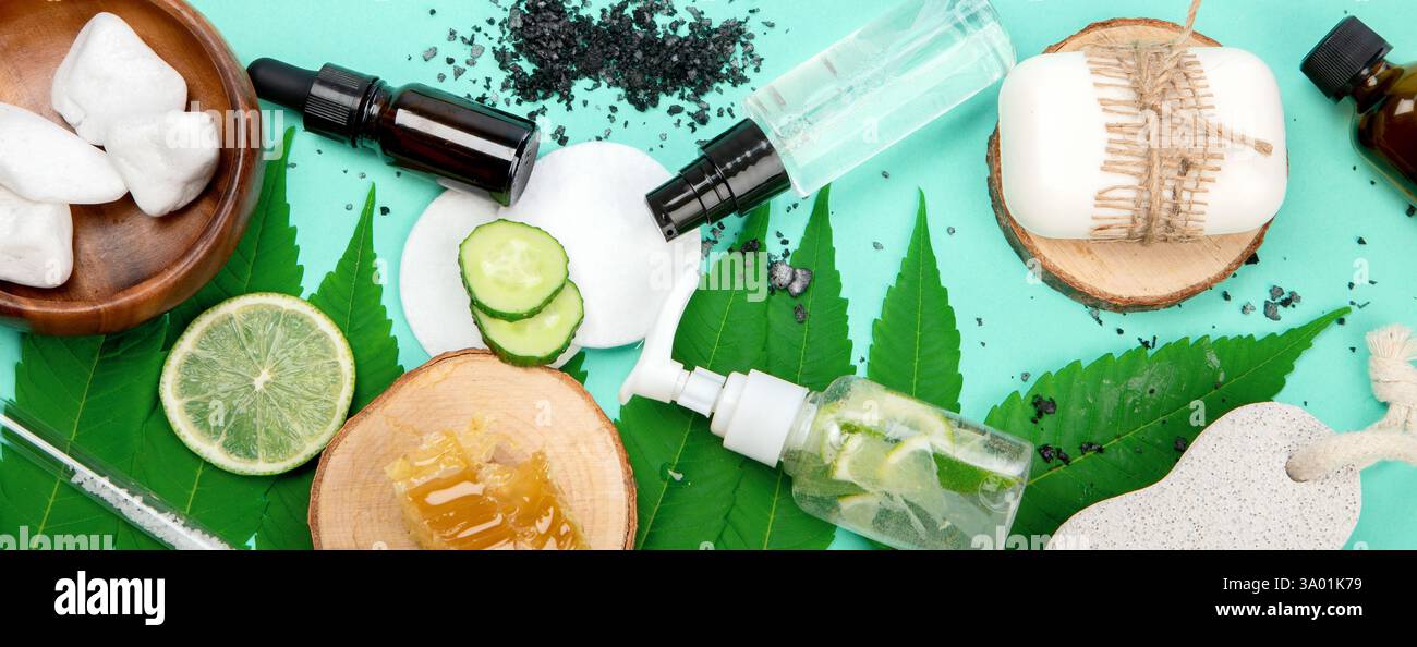 Face and body care products assortment on green background. Natural ...