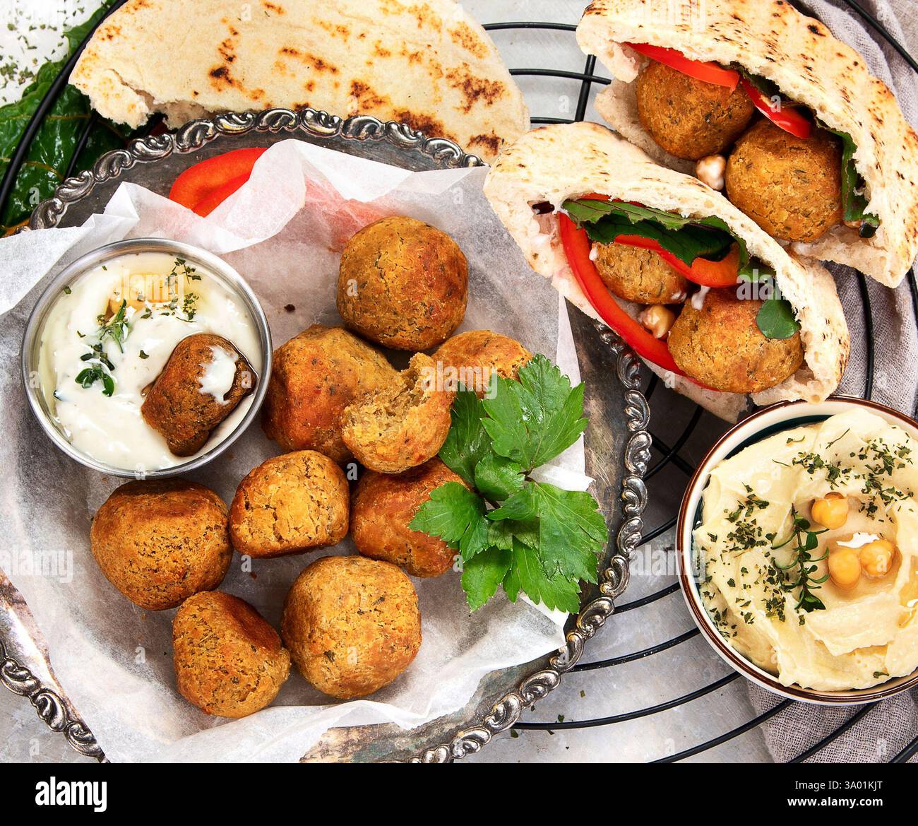 Middle eastern, arabic dishes with falafel, hummus, pita. Halal food ...