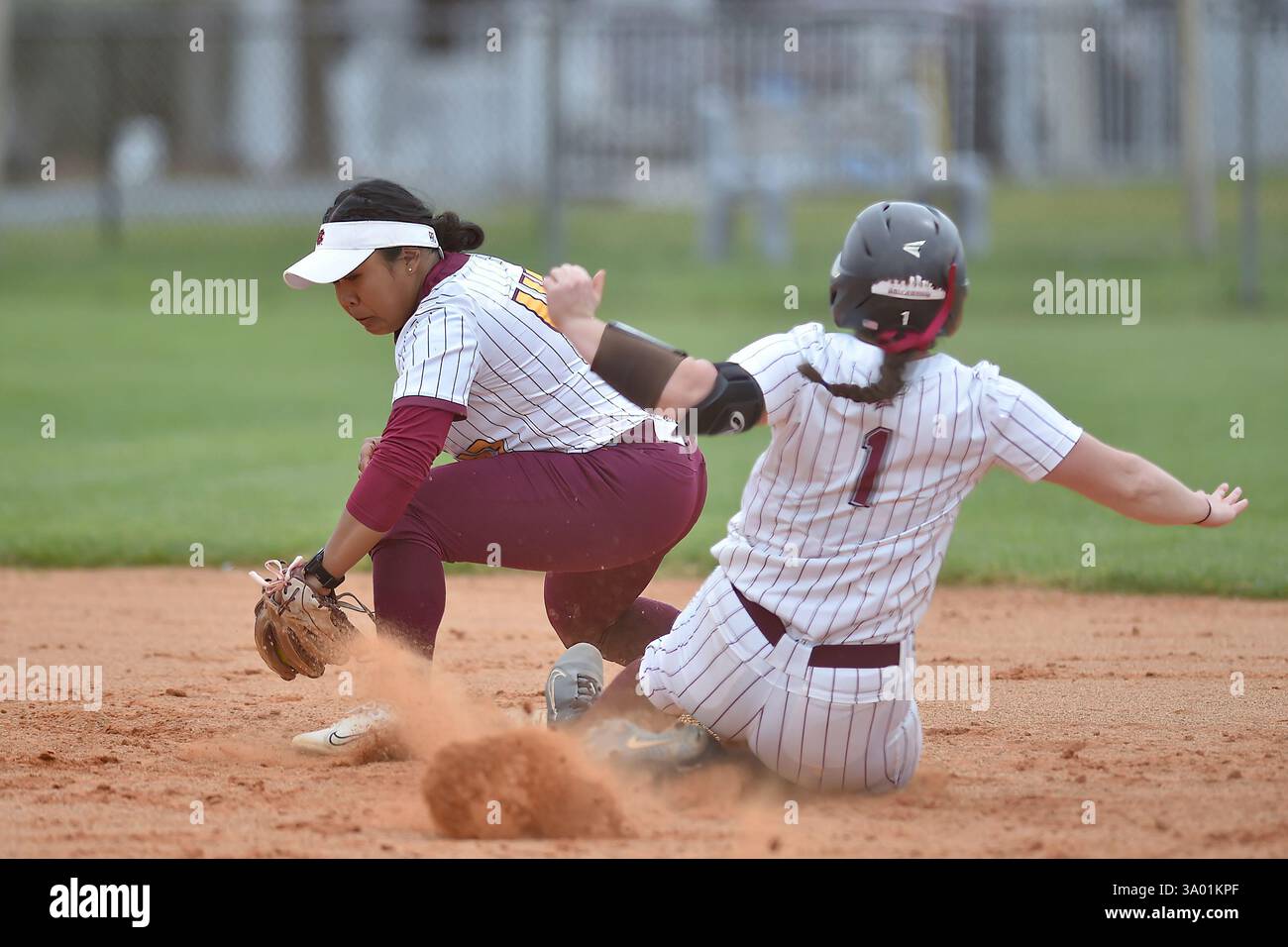 Bellarmine University's Harlie Bickett (1) successfully stretches a ...