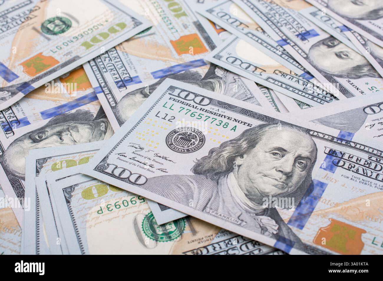 Spool of linen spool is placed on spread US dollar Banknotes Stock ...
