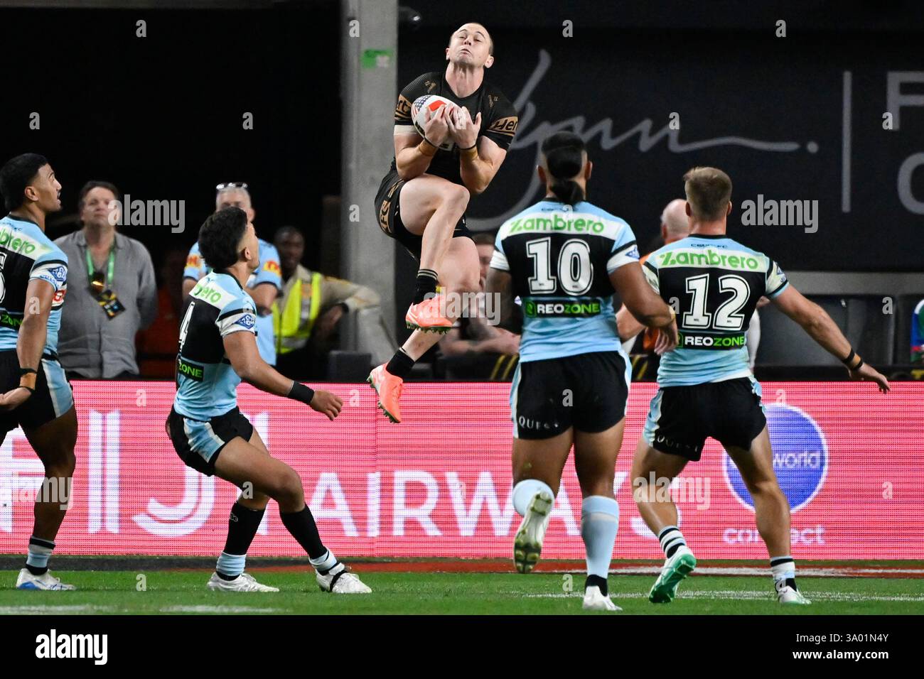 Penrith Panthers Dylan Edwards leaps to catch the ball during Australia ...