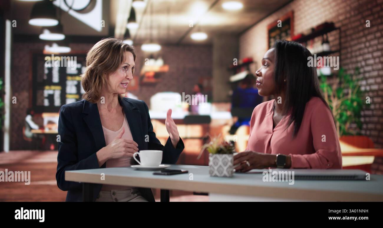 Coffee Shop Meeting for Multiracial Coworkers Happy to Discuss Work ...