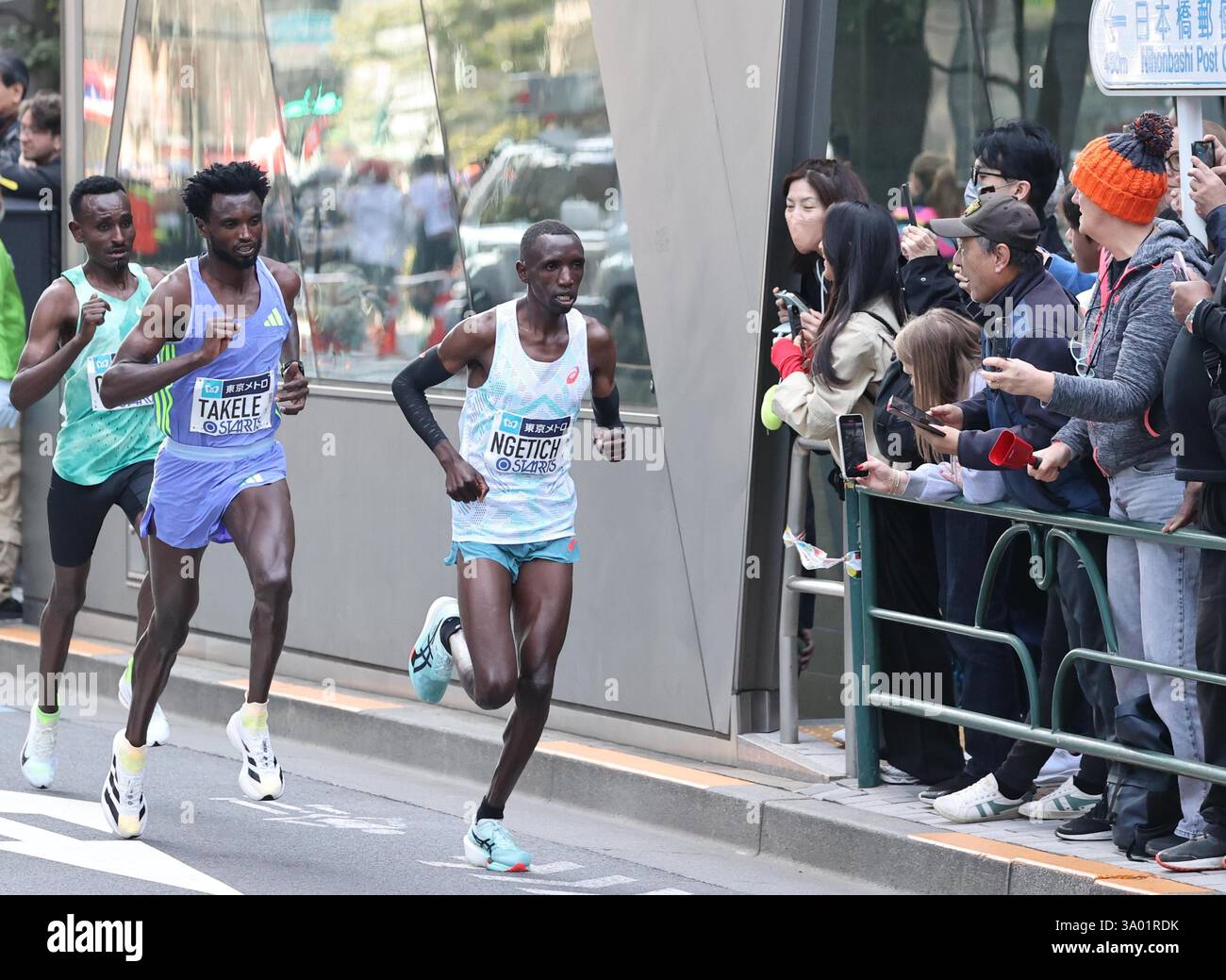 Tokyo. 2nd Mar, 2025. Ethiopia's Tadese Takele (2nd L) competes during ...