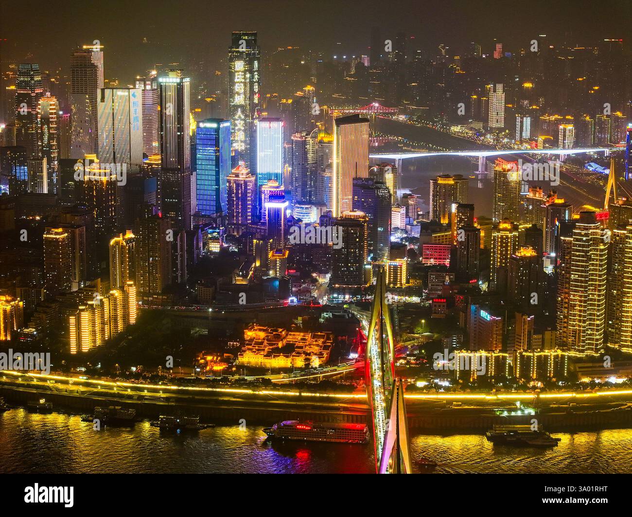 (250302) -- CHONGQING, March 2, 2025 (Xinhua) -- An aerial drone photo shows a night view of the ...