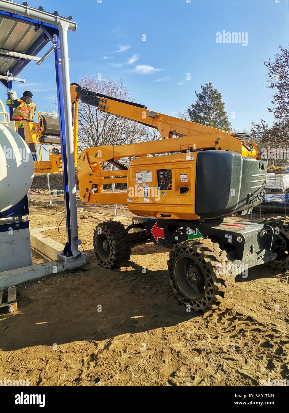 Heavy machinery involved in the process steel structure is under ...