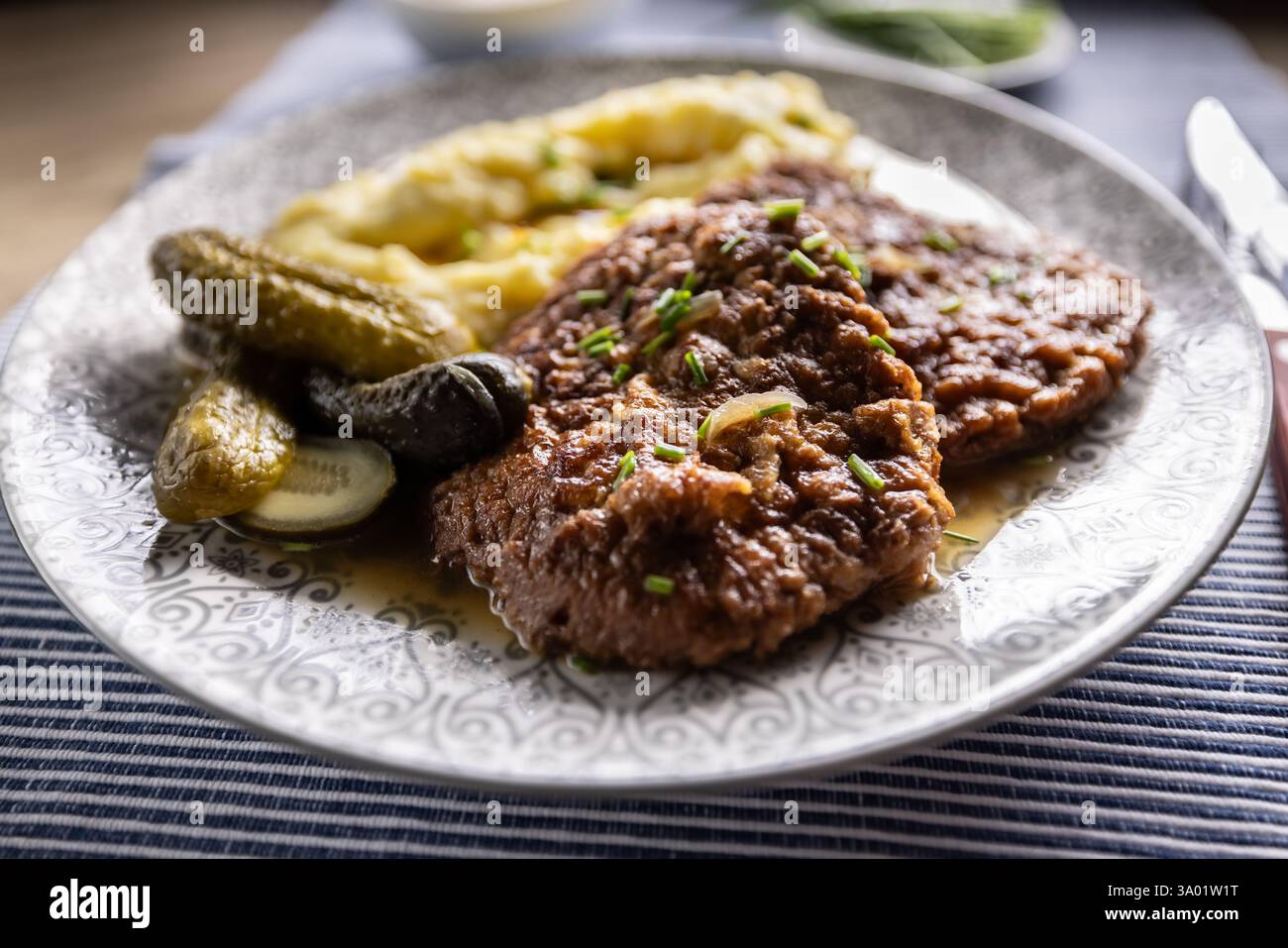 Inverted Beef Schnitzel with Mashed Potatoes and Pickled Cucumbers ...