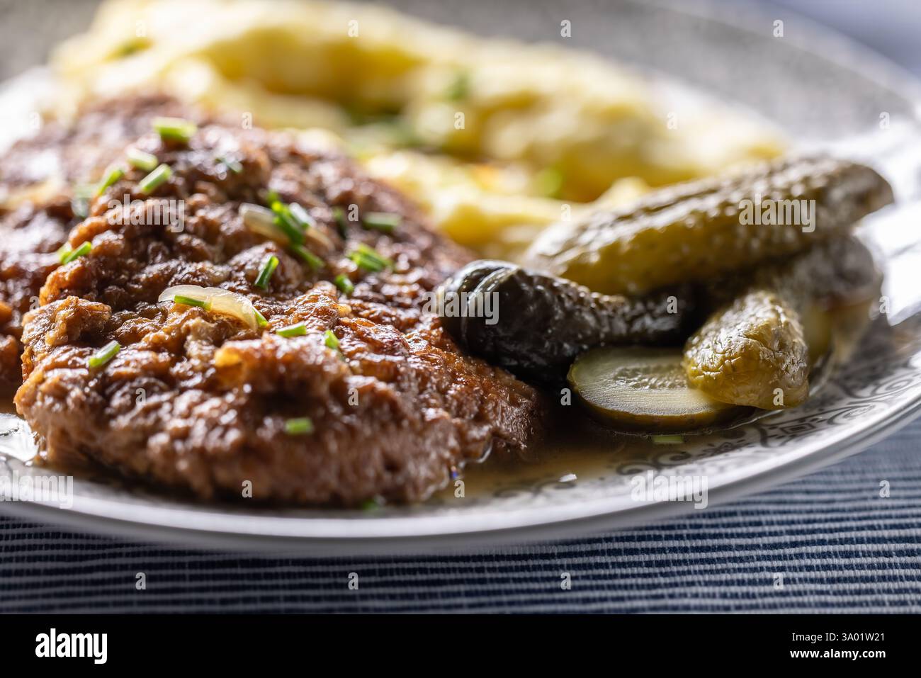 Inverted Beef Schnitzel with Mashed Potatoes and Pickled Cucumbers ...