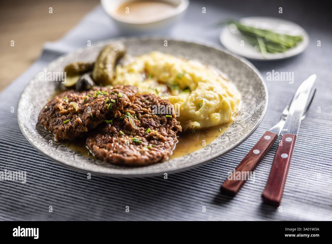 Inverted Beef Schnitzel with Mashed Potatoes and Pickled Cucumbers ...