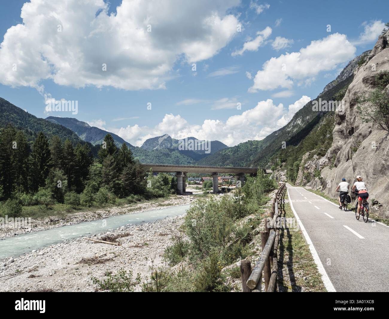 A paved cycling path along the Alpe Adria Radweg in Italy, surrounded ...