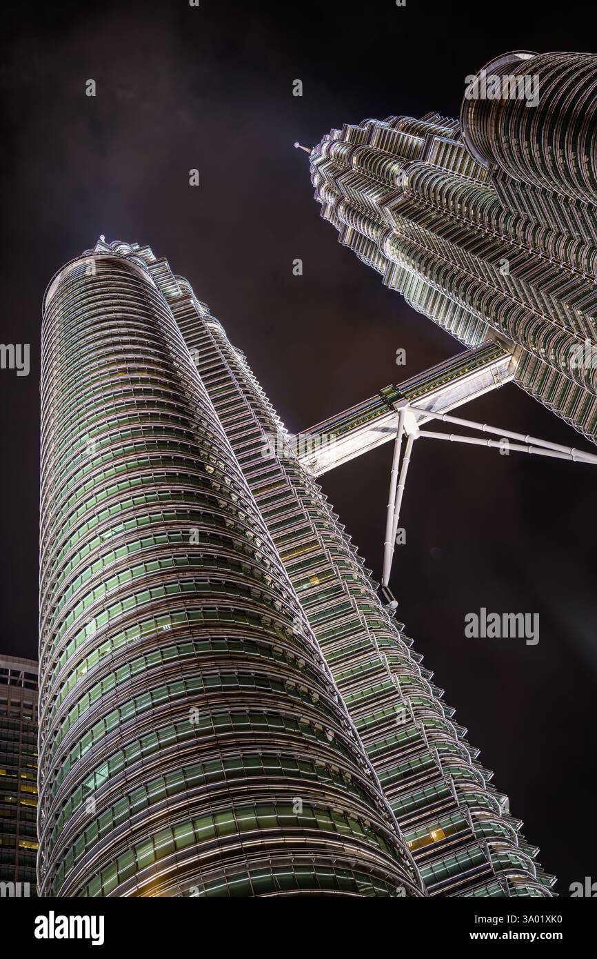 A close-up, night time image of the Petronas Twin Towers, Kuala Lumpur ...