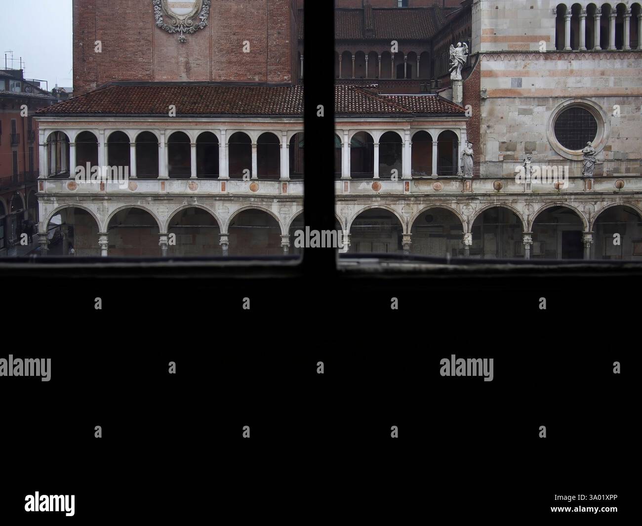 Cremona, Italy November 15th 2021 View from a window framing the Loggia ...
