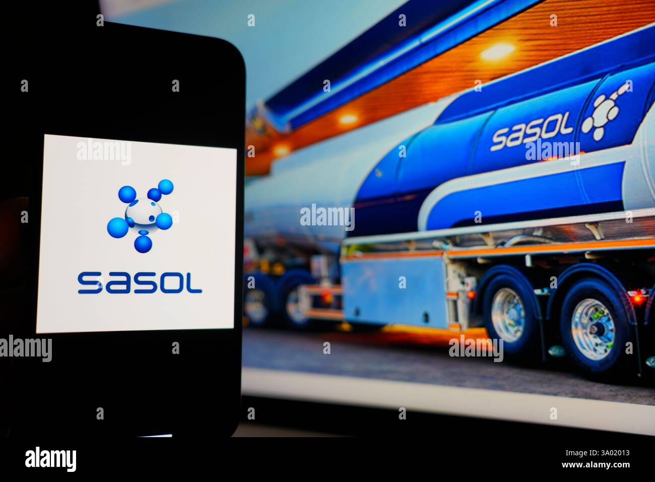Roosendaal, The Netherlands - March 1, 2025: A mobile phone displaying the logo of Sasol, with ...
