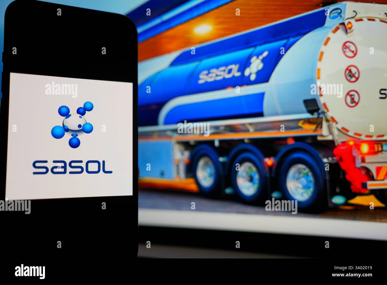 Roosendaal, The Netherlands - March 1, 2025: A mobile phone displaying the logo of Sasol, with ...