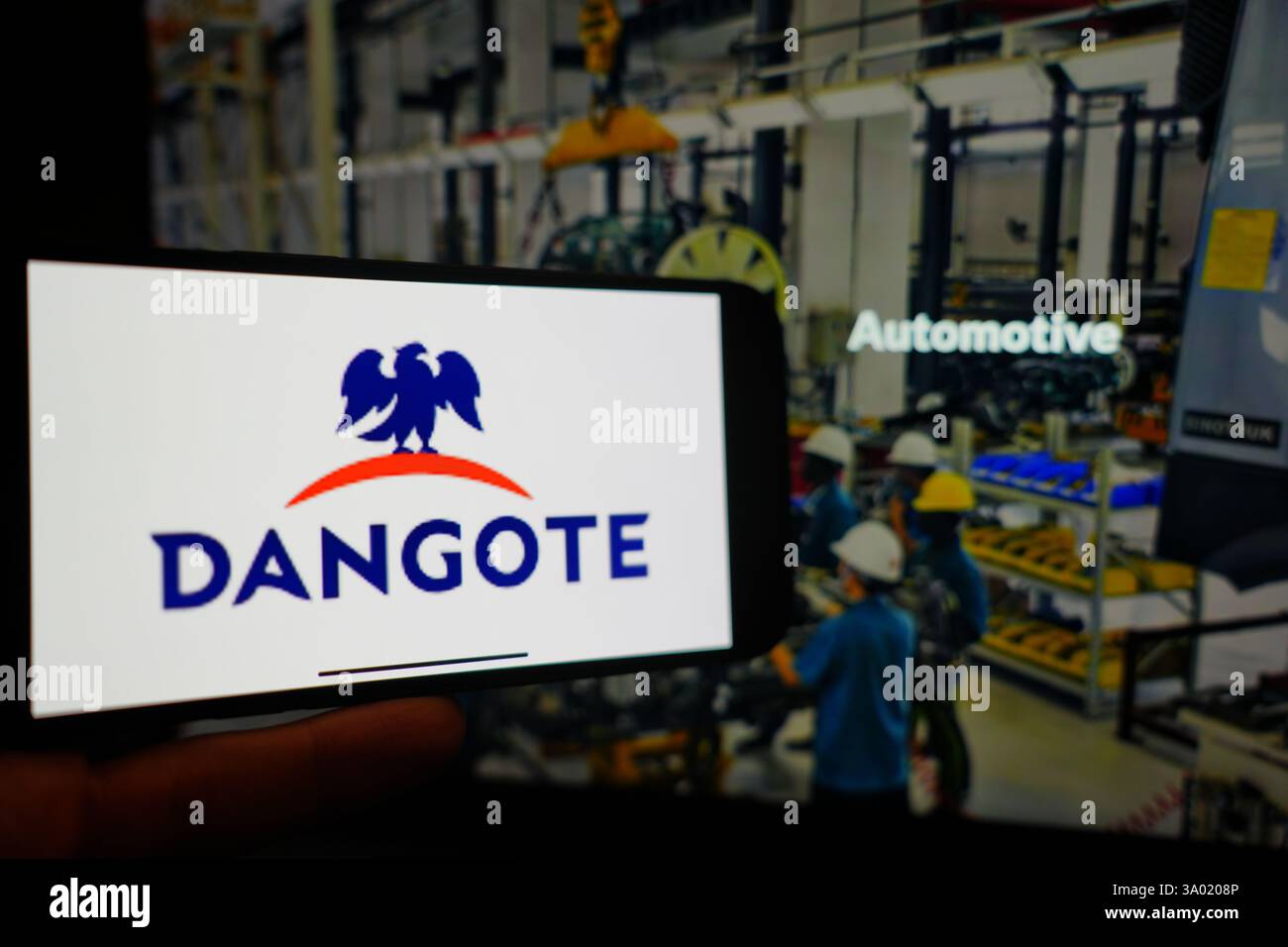 Roosendaal, The Netherlands - March 1, 2025: A mobile phone displaying the logo of Dangote Group ...