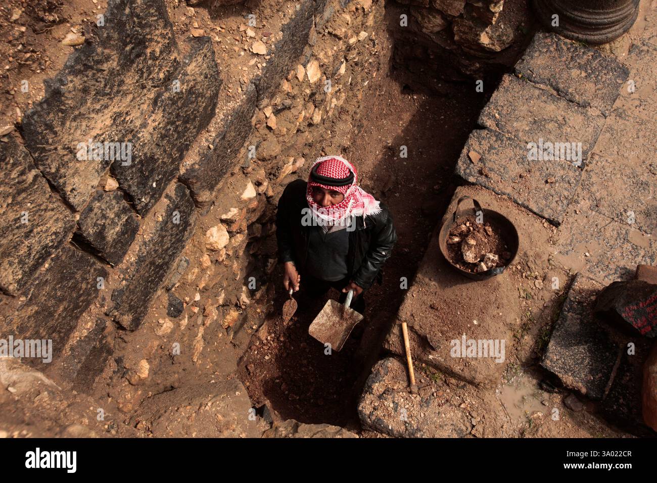 A Jordanian man wearing red and white checked shemagh keffiyeh ...