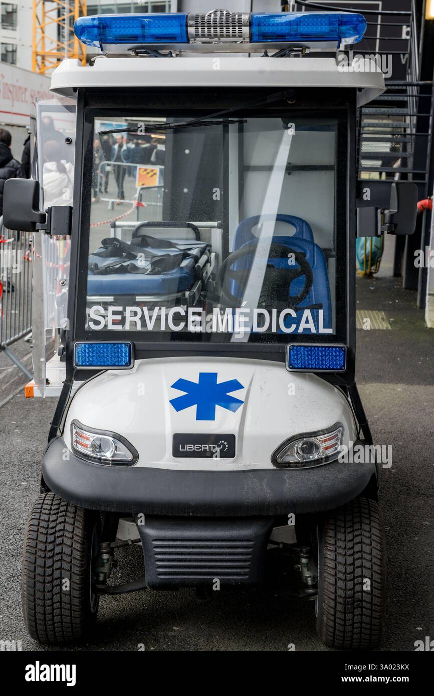 Emergency medical vehicle ready for swift response at bustling event in ...