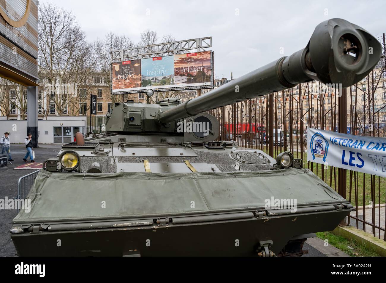 Soviet tank on display outside a historical center engaging visitors ...