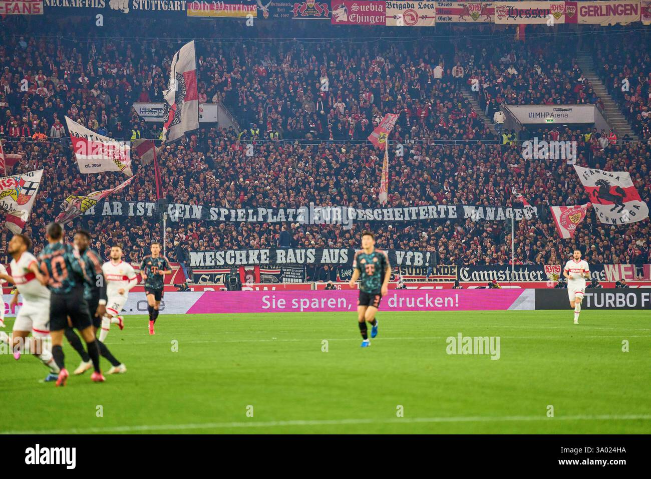VFB fans demonstrate against former Porsche AG Finanzvorstand Lutz ...