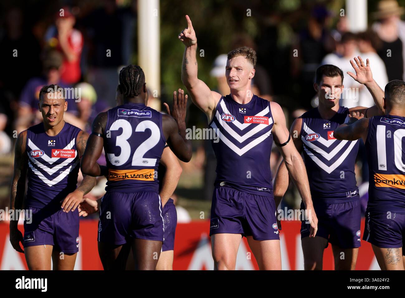 Josh Treacy of the Dockers celebrates after kicking a goal during the ...