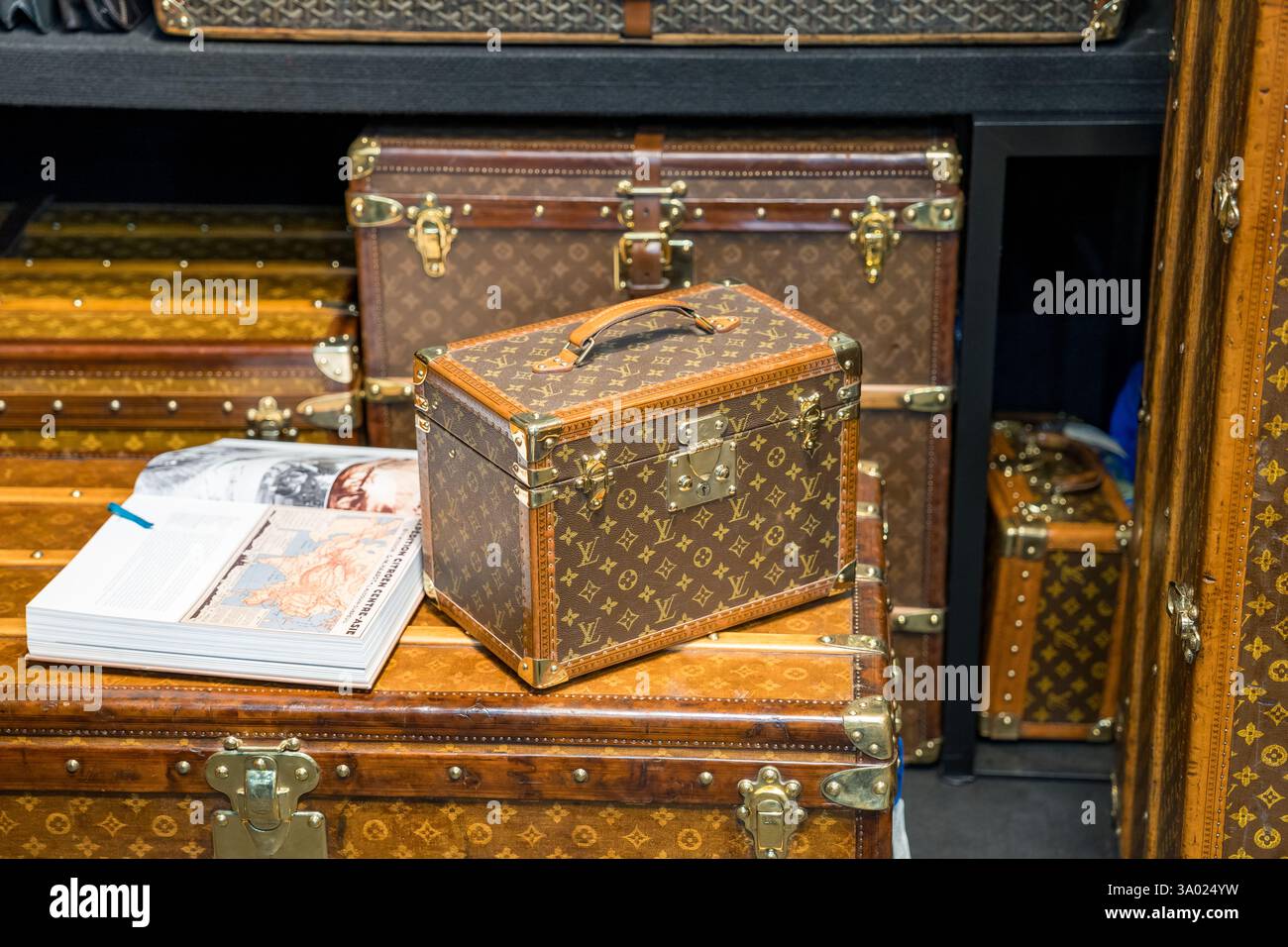 Vintage travel trunks arranged artfully in a luxurious boutique ...