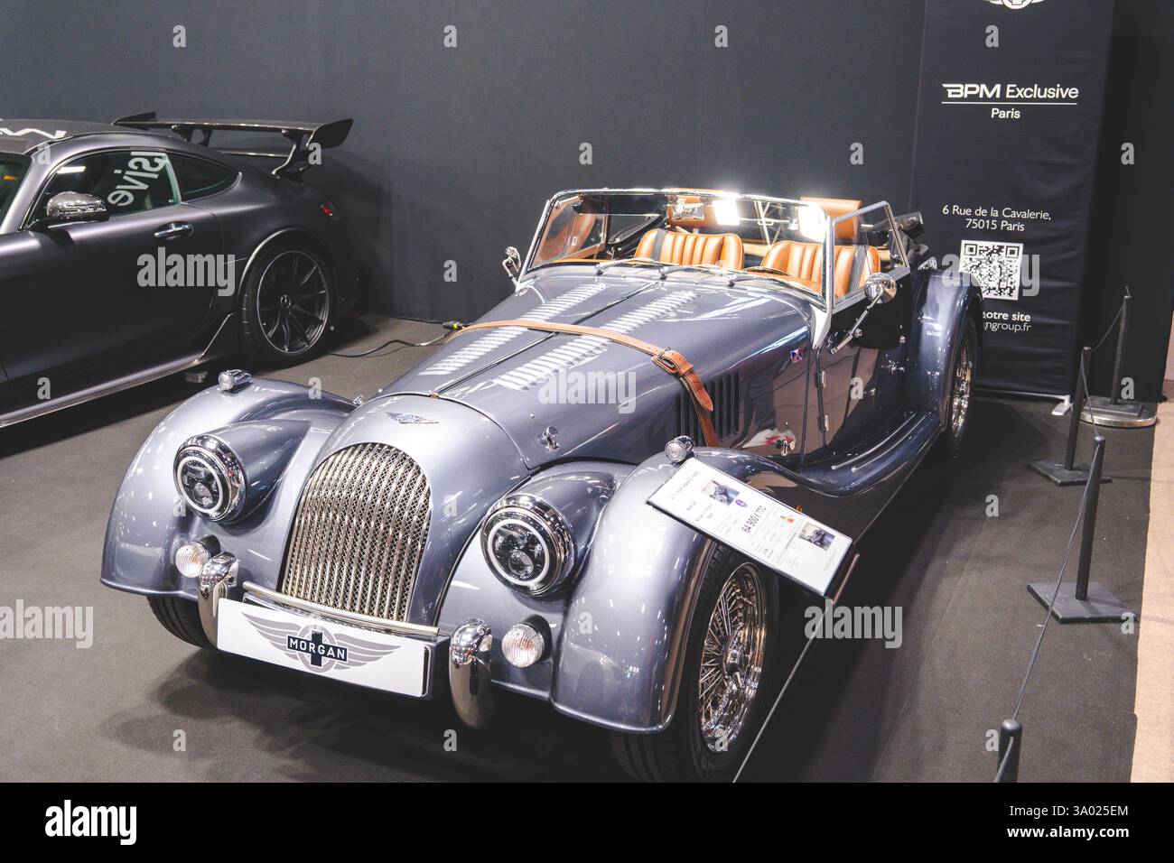 Classic elegance meets modern craftsmanship at a luxury car showcase in ...