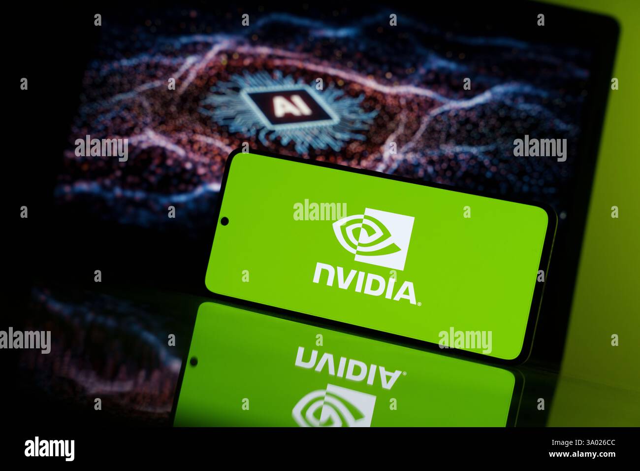 NVIDIA logo on a smartphone screen with a blurred AI background. Marc 2 ...