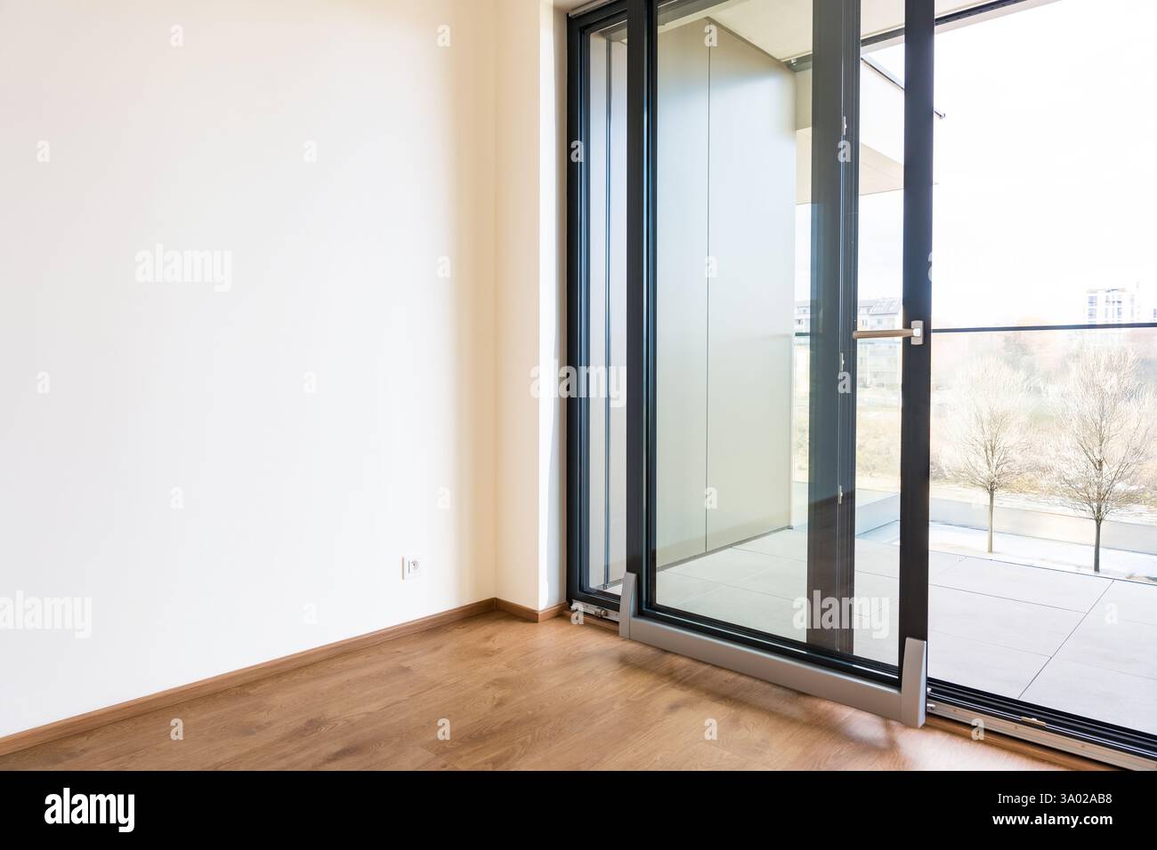 Tilt and slide glass door system for modern balcony access in ...