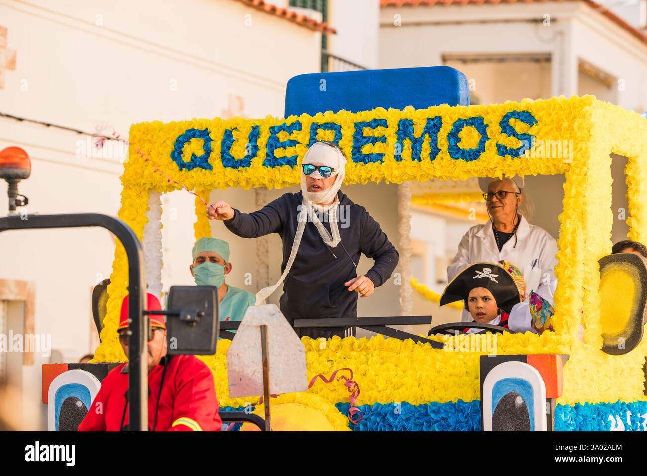 Altura, Portugal, March 1, 2025. Creative ambulance-themed float adds ...