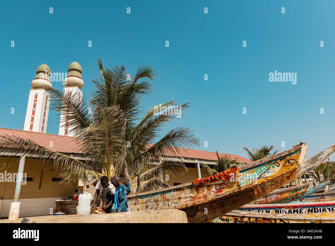 Fishing boats on the beach of Dakar Senegal Stock Photo - Alamy