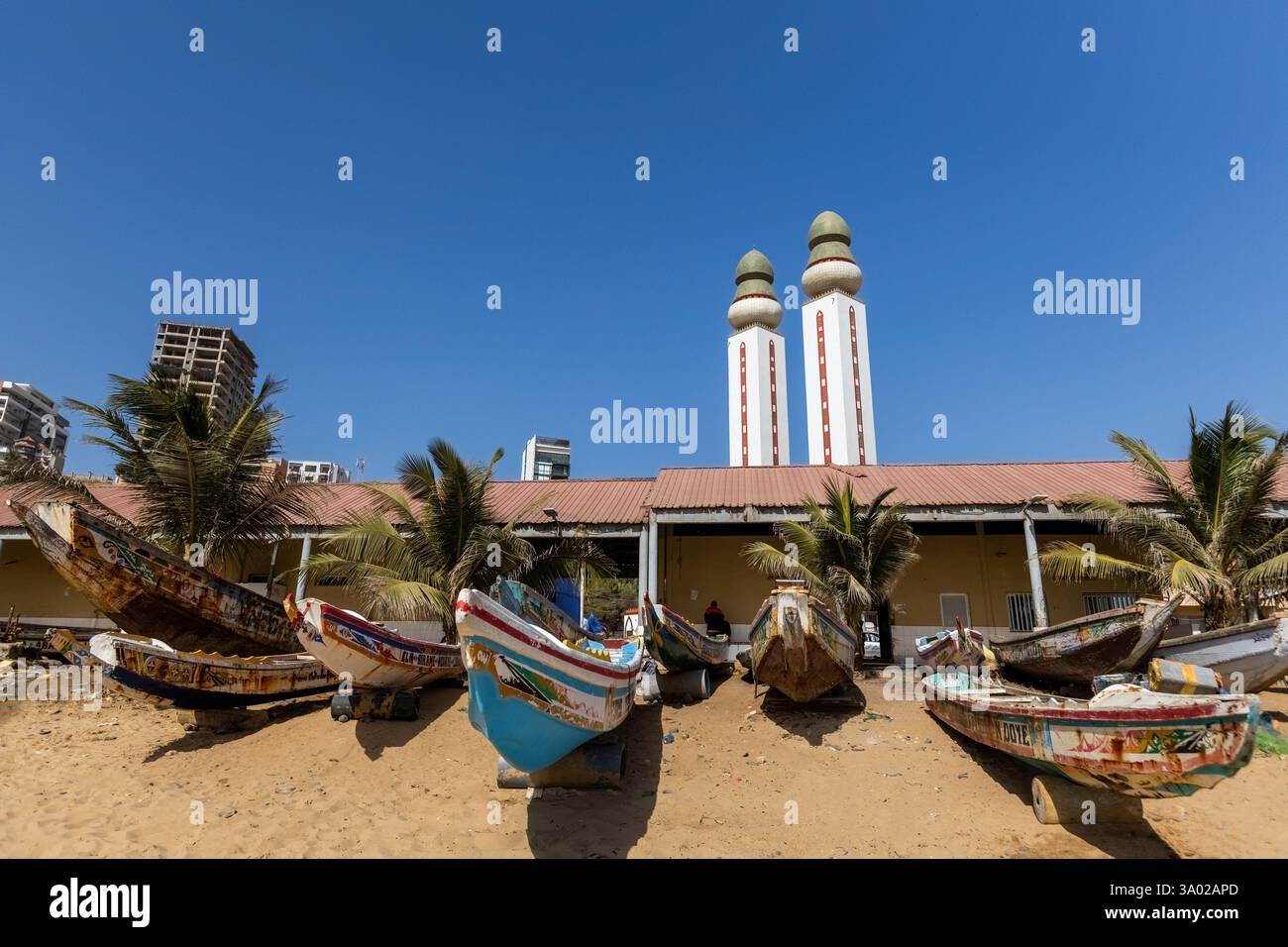 Fishing boats on the beach of Dakar Senegal Stock Photo - Alamy